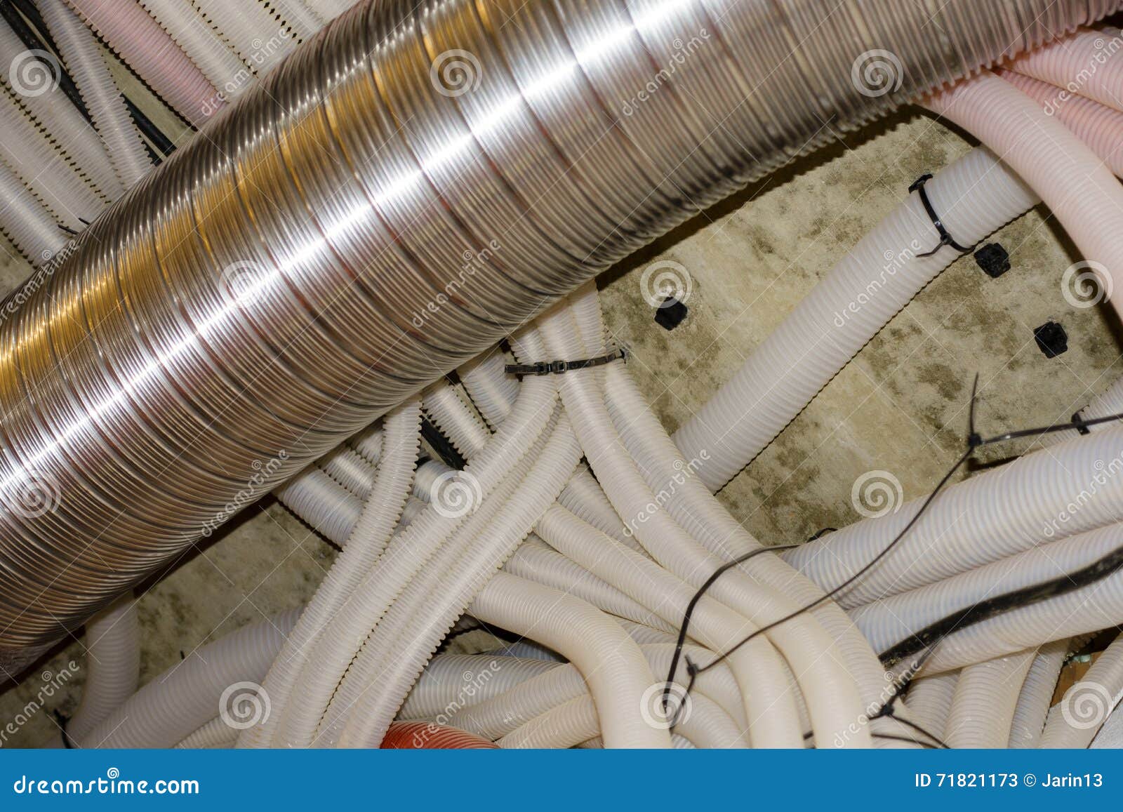 Cable mess in new building stock image. Image of tube - 71821173