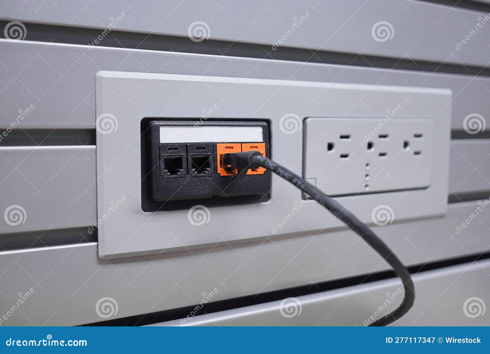 Cable Plugged into Wall Socket Stock Image - Image of office, digital ...