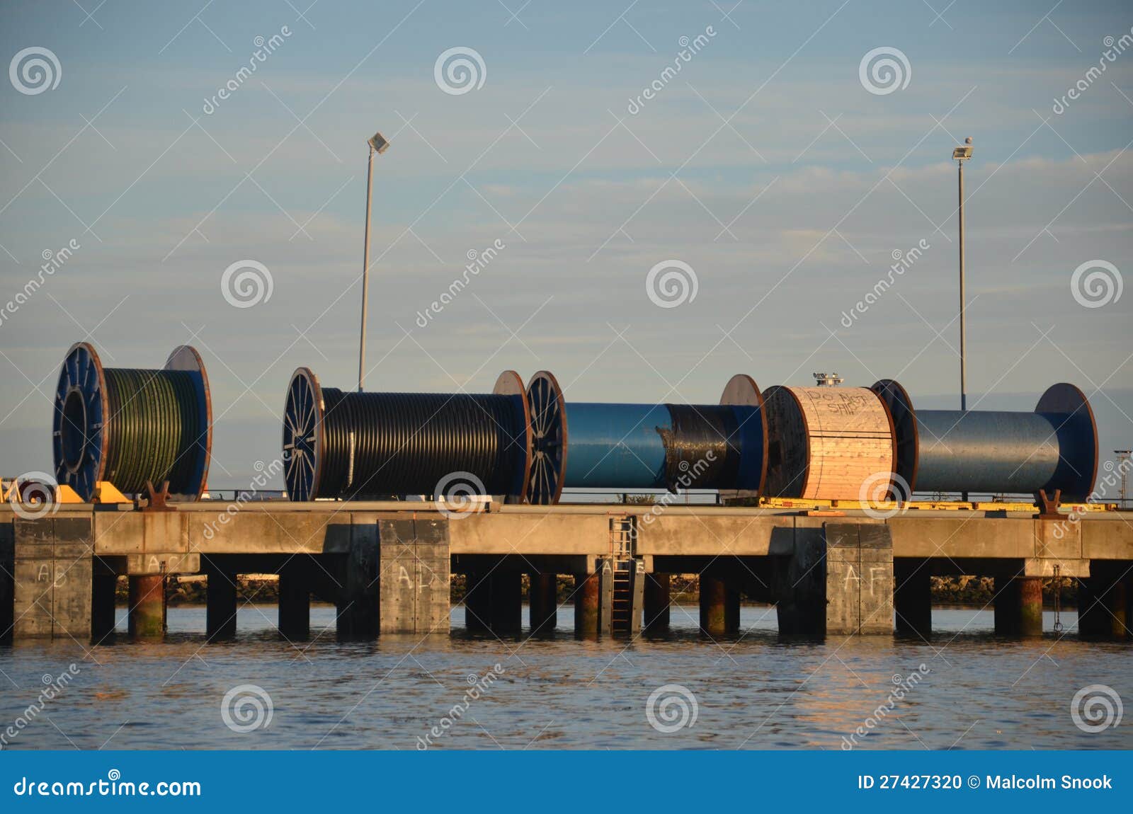 Cable reels on dock stock photo. Image of electric, load - 27427320