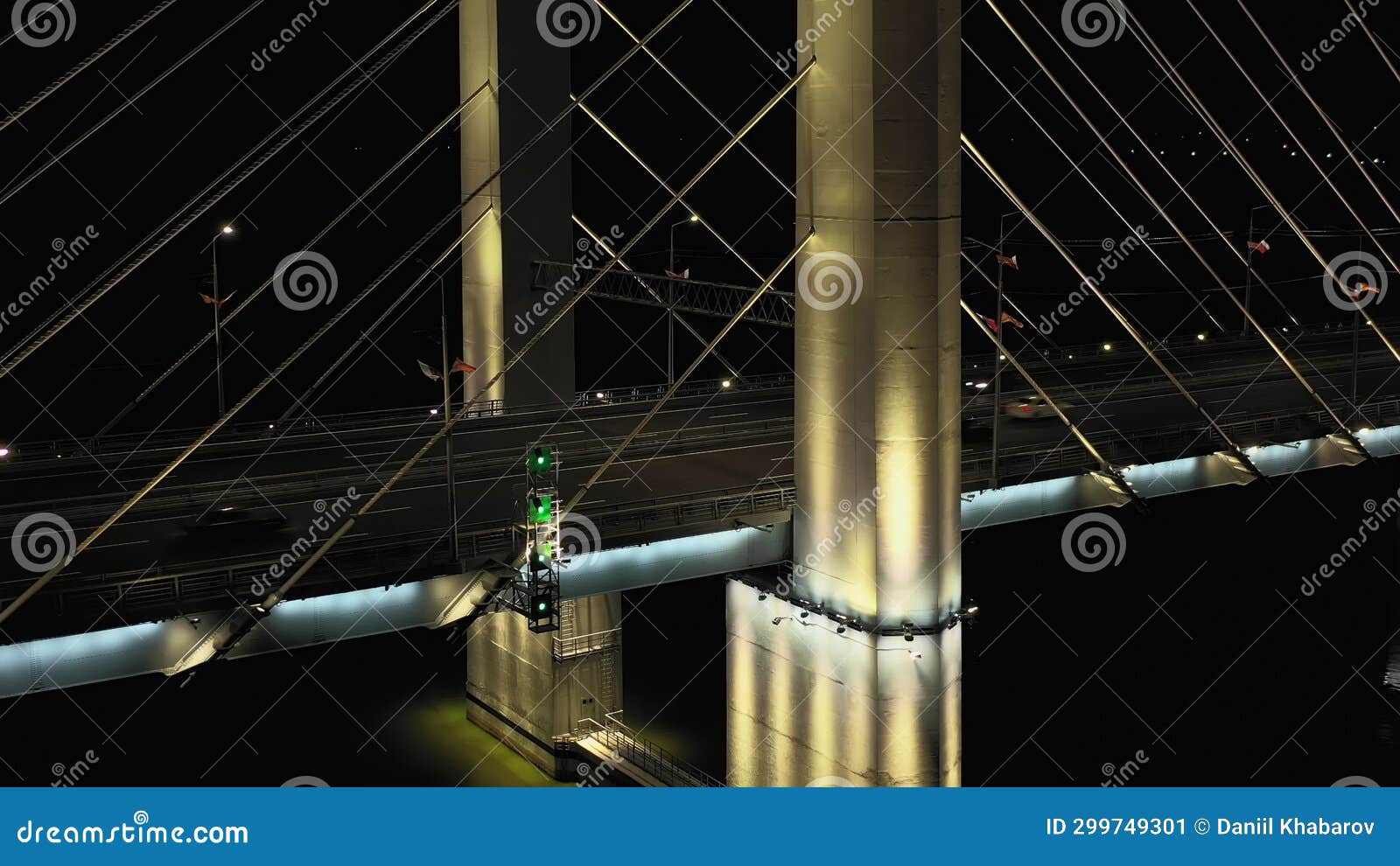 A Cable-stayed Highway Bridge with Tall Concrete Pylons Illuminated by ...
