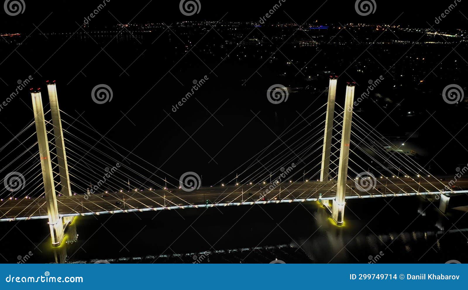 A Cable-stayed Highway Bridge with Tall Concrete Pylons Illuminated by ...