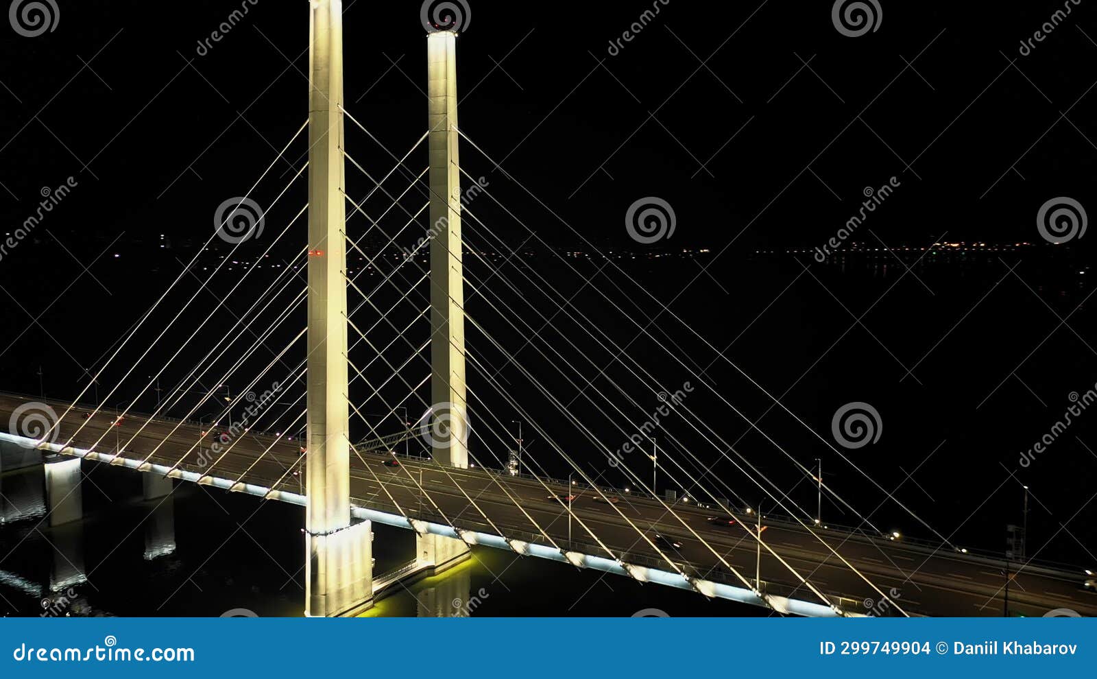 A Cable-stayed Highway Bridge with Tall Concrete Pylons Illuminated by ...
