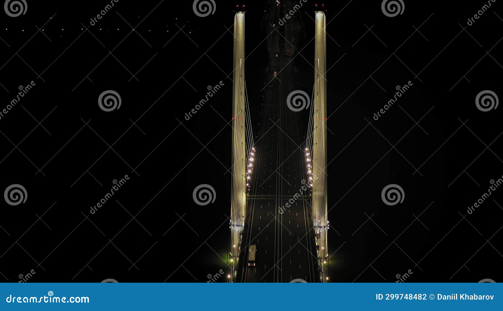 A Cable-stayed Highway Bridge with Tall Concrete Pylons Illuminated by ...