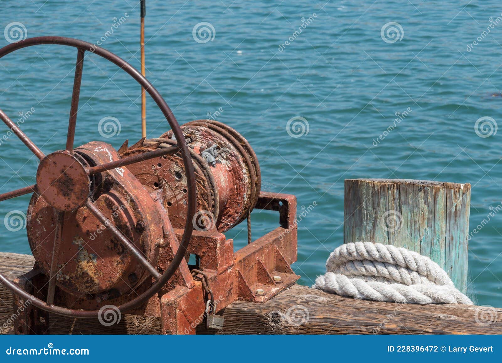 Cable Winch on a Marina Boat Dock Stock Photo - Image of gear, color ...