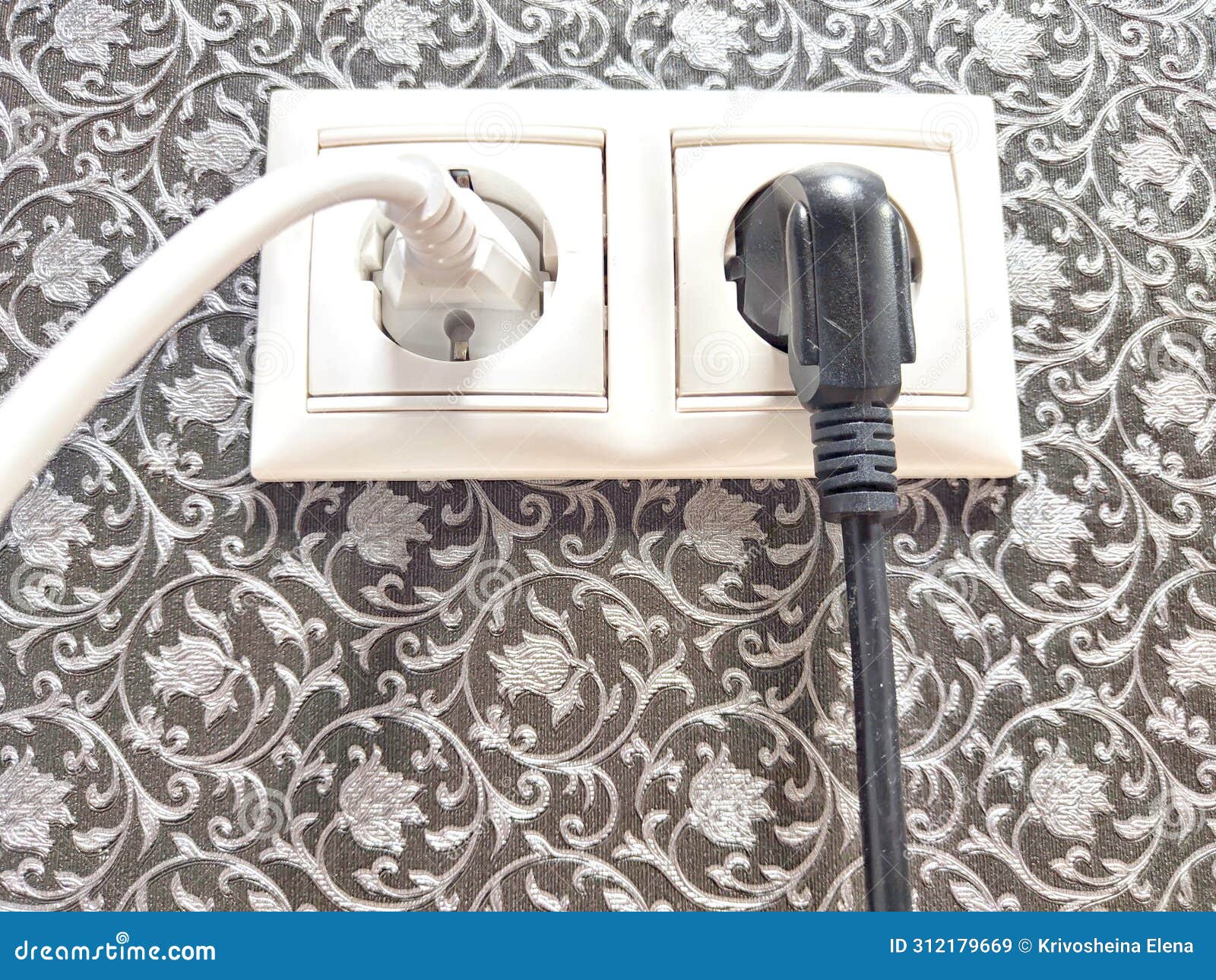 Cables Connected To Power Sockets Against a Decorative Wall. Dual ...