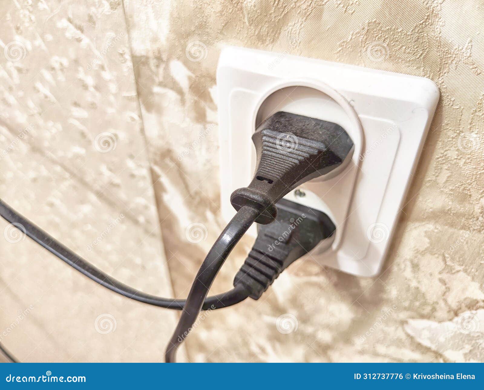Cables Connected To Power Sockets Against a Decorative Wall. Dual ...