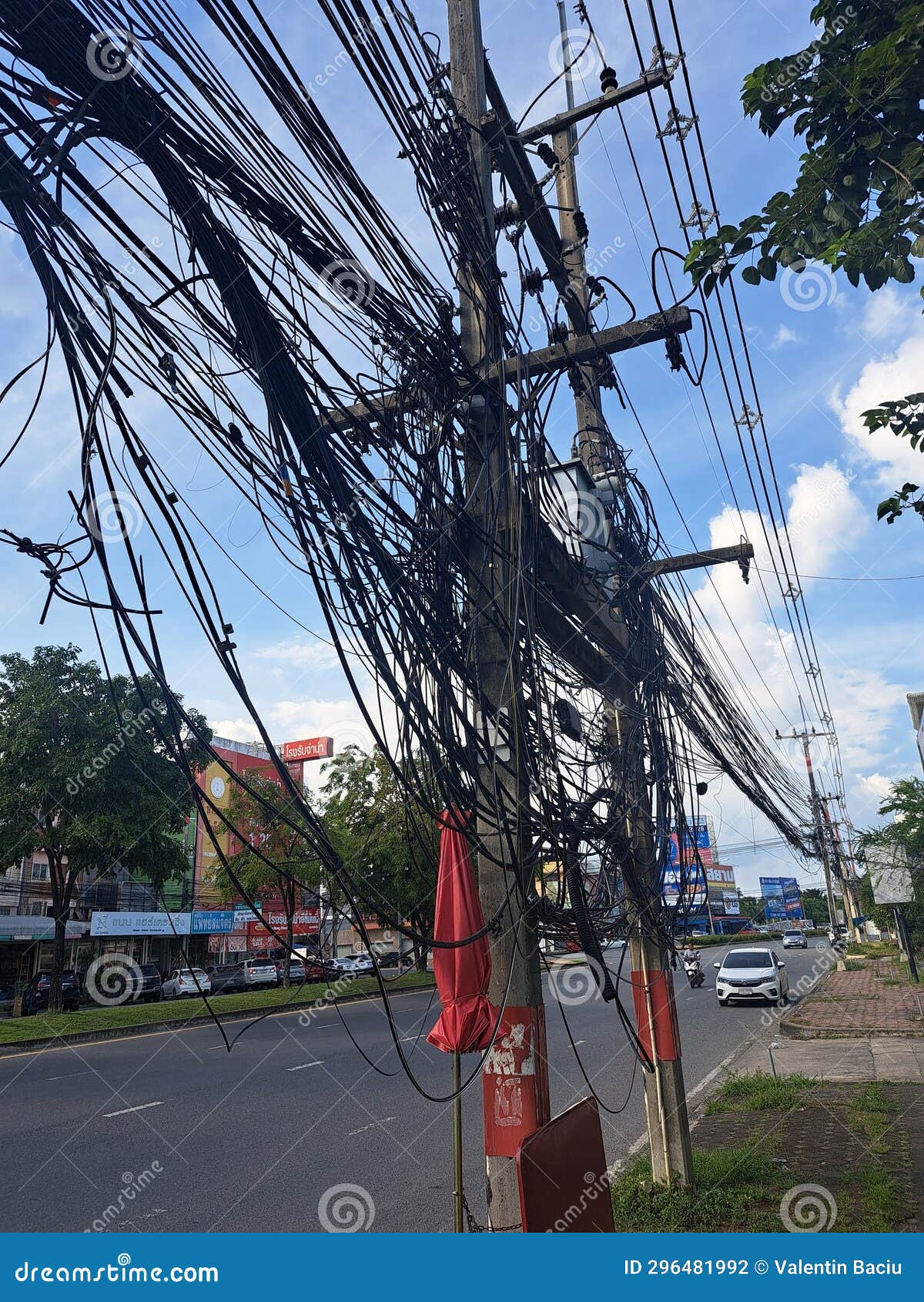 Cables Hanging from a Pole on a Street in Chachoengsao, Thailand Stock ...