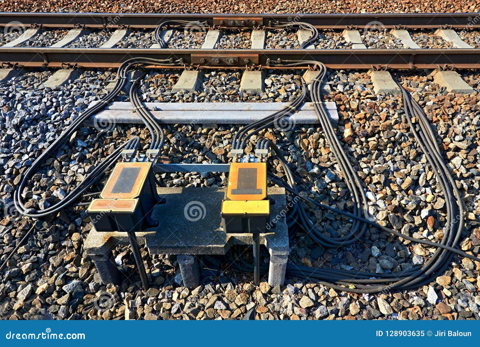 Cables on rails stock image. Image of control, sleeper - 128903635