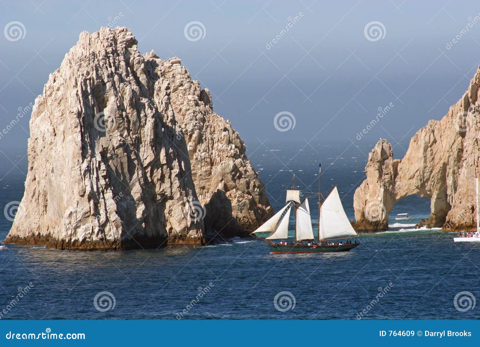 Cabo Rocks and Sailboat 2 stock image. Image of sailing - 764609