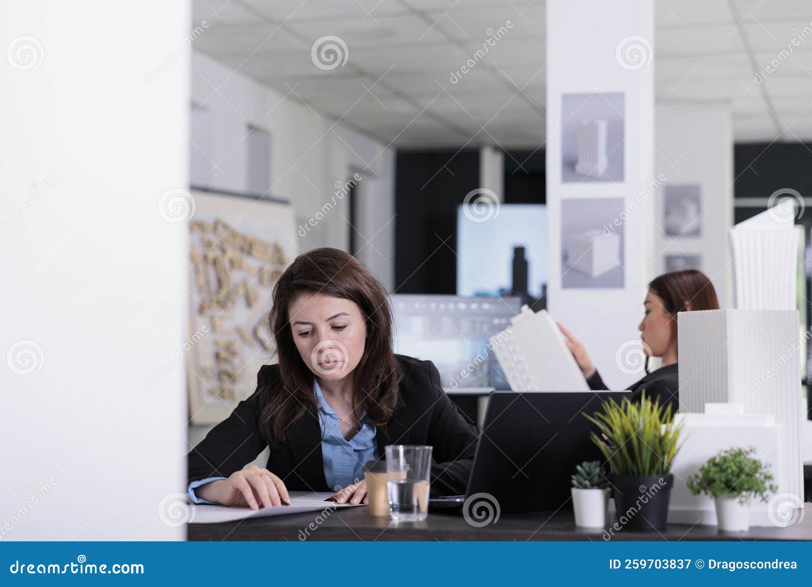 Cad Designer Working with Project Blueprint in Coworking Space Stock ... Cad Designer Working with Project Blueprint in Coworking Space Stock ...