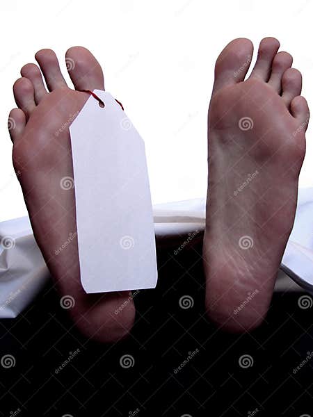 Cadaver with blank toe tag stock image. Image of buried - 1332079