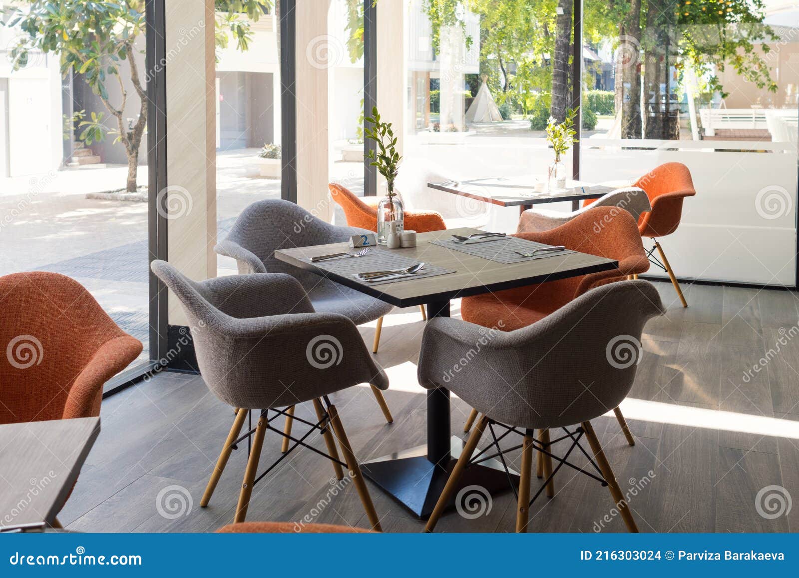 Cafe Interior Design with Table, Chairs Near Big Windows Stock Photo ...