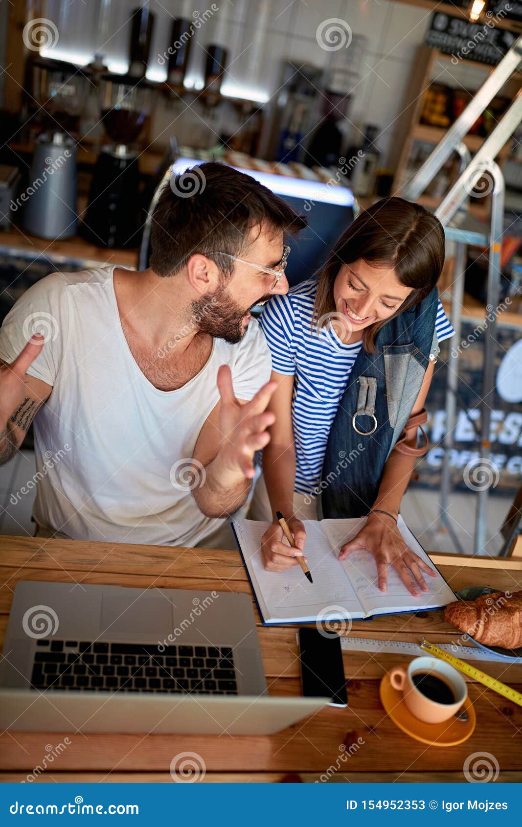 Cafe Managers Working on Laptop in Cafe Stock Image - Image of ...