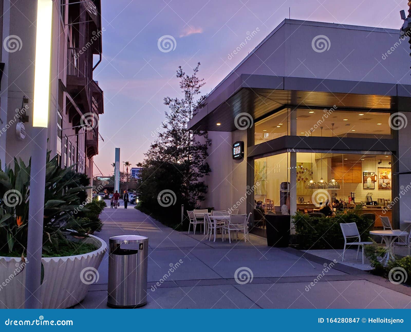 Cafe Next To Retail Stores at Sunset Editorial Photography - Image of ...