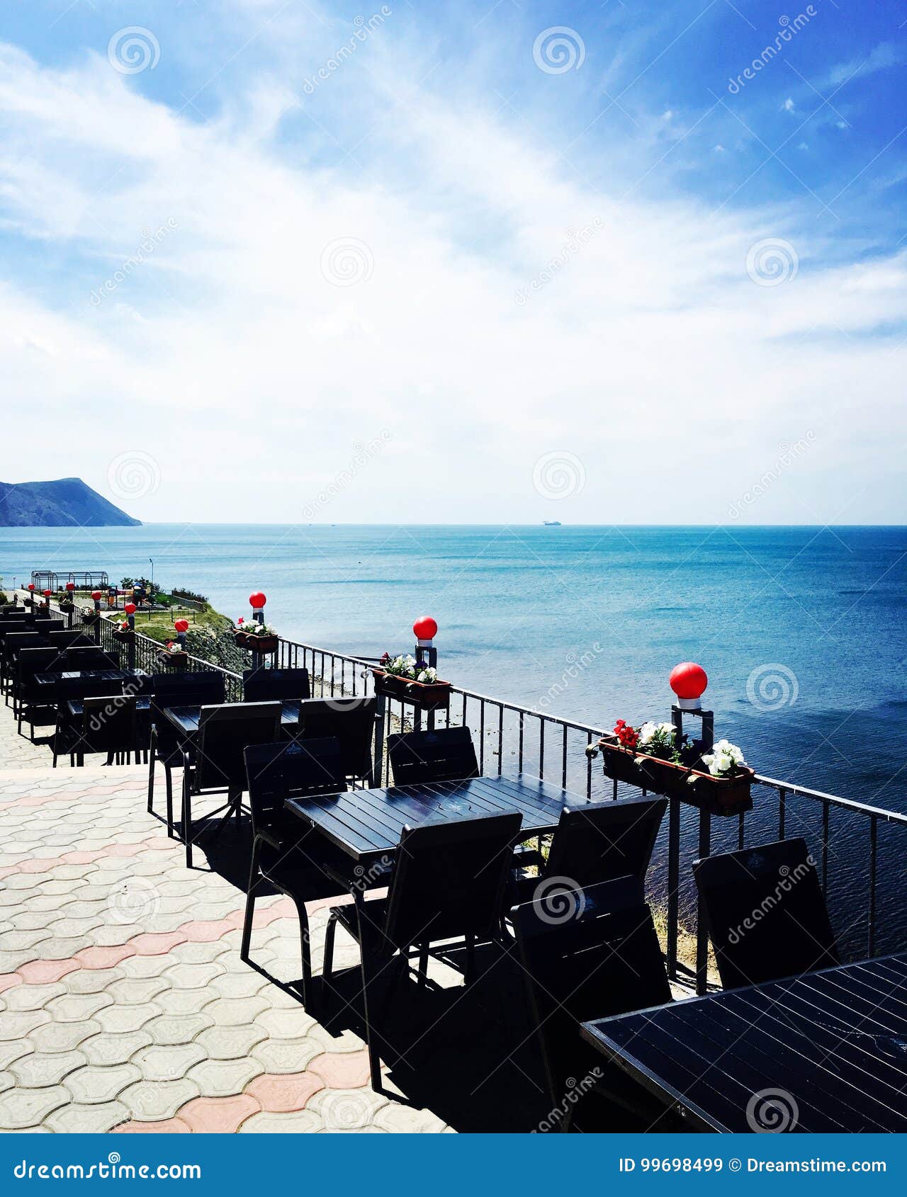 Cafe overlooking the sea stock image. Image of cafe, recreation - 99698499