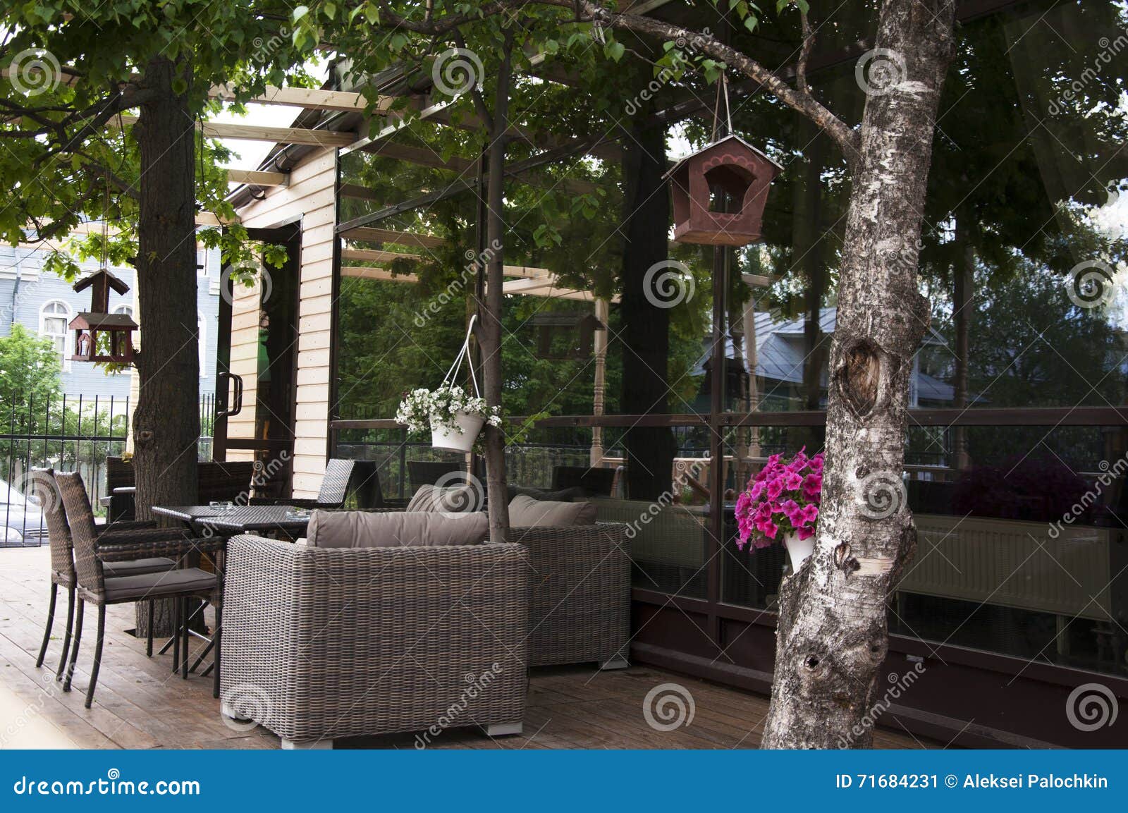 Cafe terrace in the shadow stock image. Image of glass - 71684231