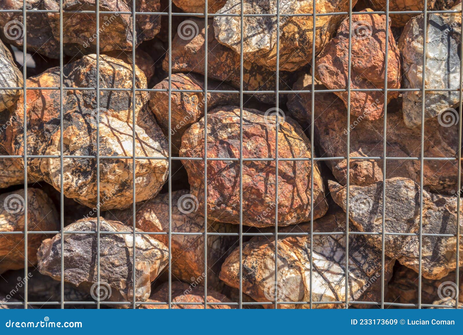 Caged stones stock image. Image of group, pattern, closeup - 233173609