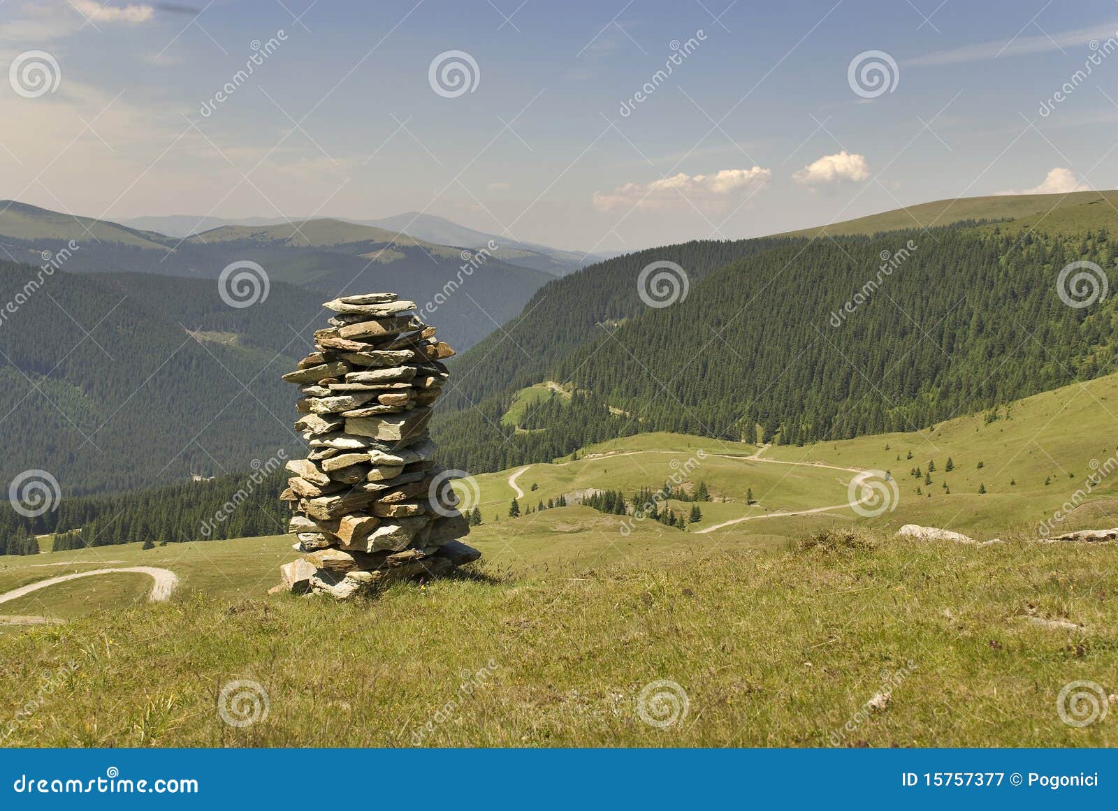 Cairn over peaceful road stock image. Image of rocks - 15757377