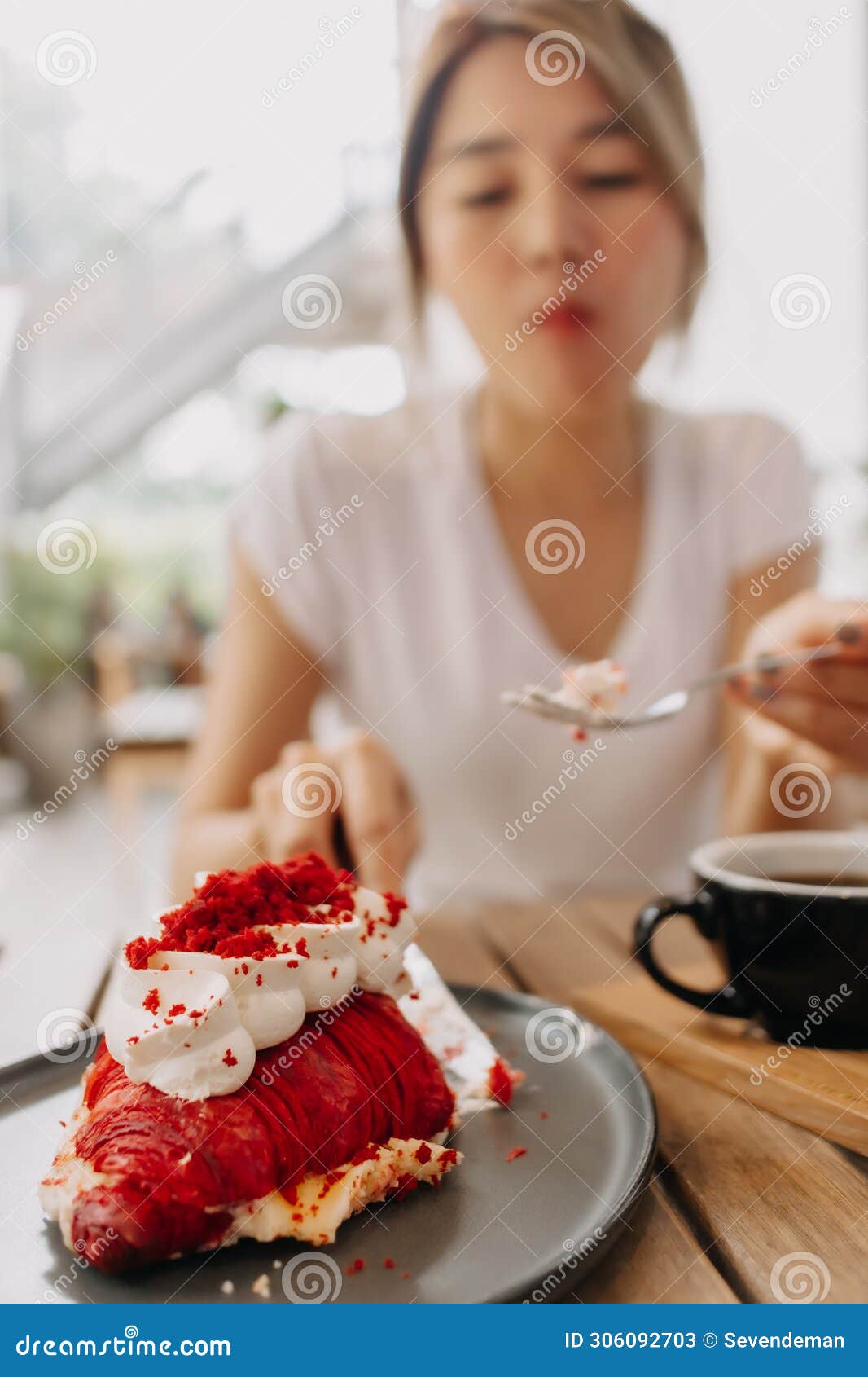 Cake Being Eat by Woman in the Cafe. Focus Selective on the Cake. Stock ...