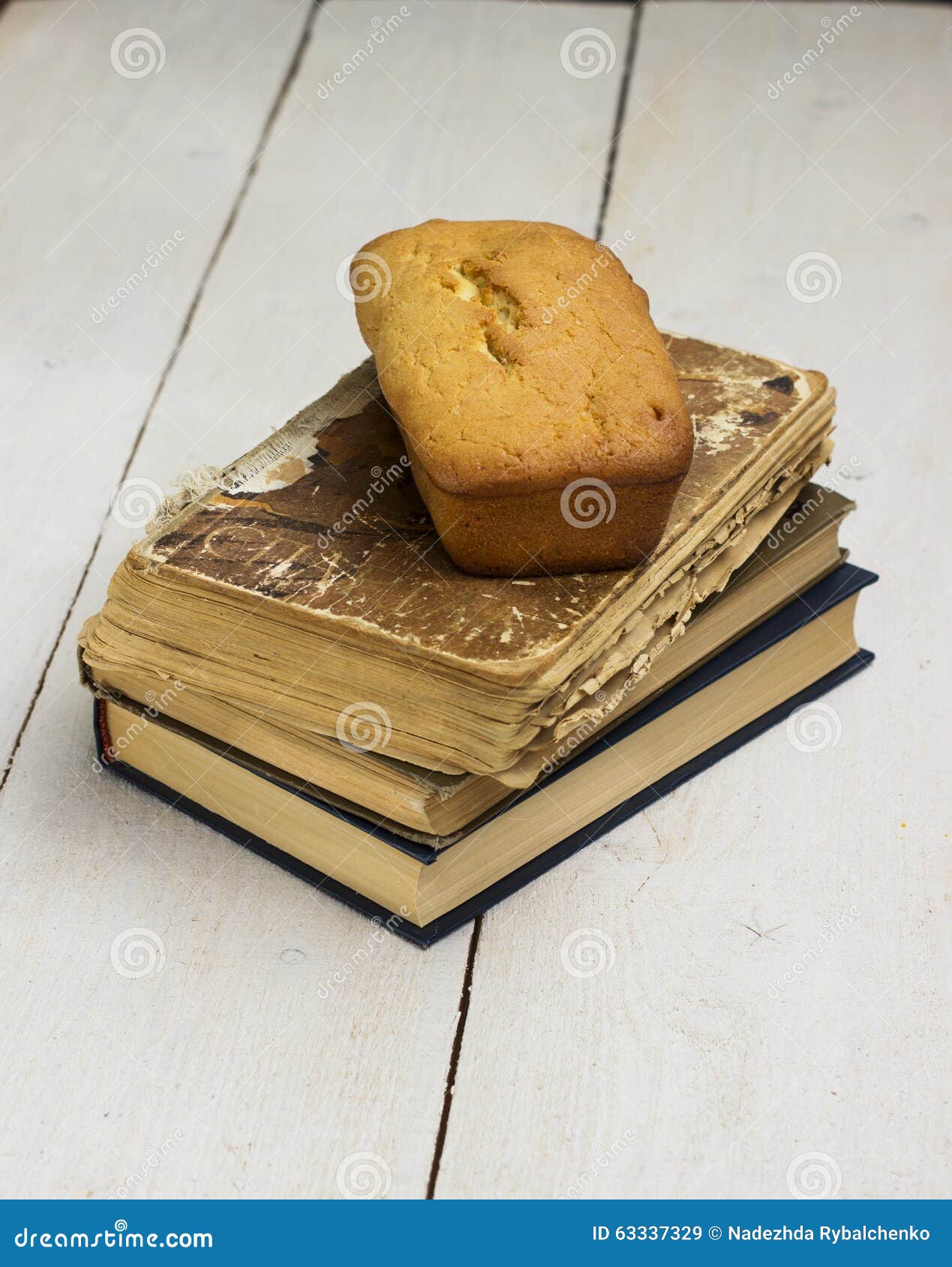 Cake and books stock image. Image of loaf, bakery, books - 63337329