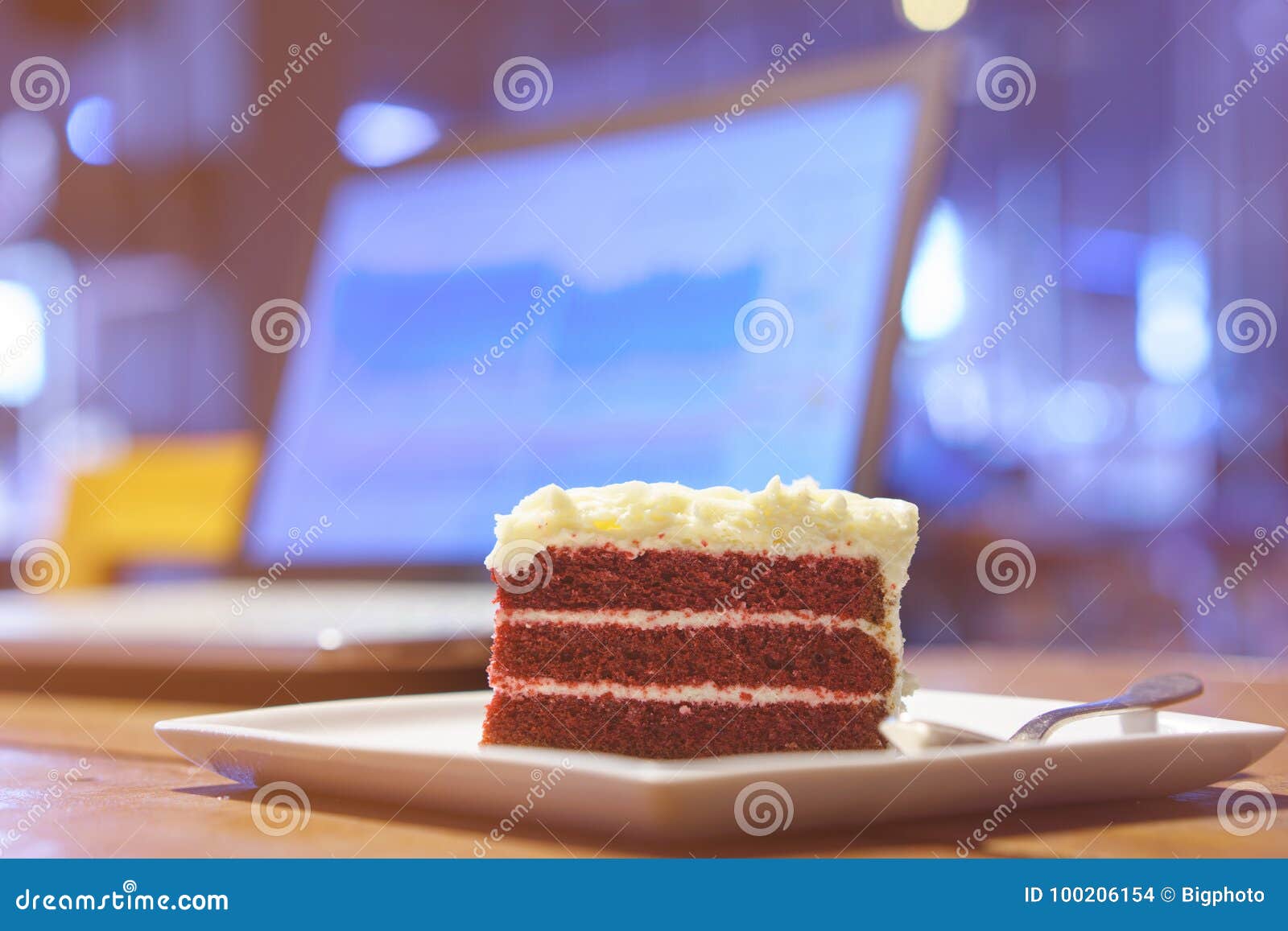 Cake Chocolate on Wood Table Work with Laptop Notebook Computer Stock ...