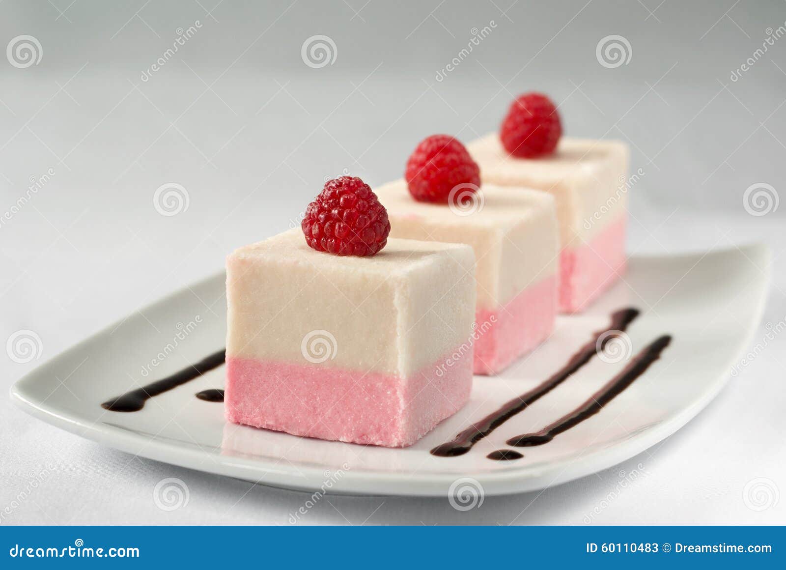 Cake Cubes White and Pink with Raspberries and Chocolate Stock Image ...