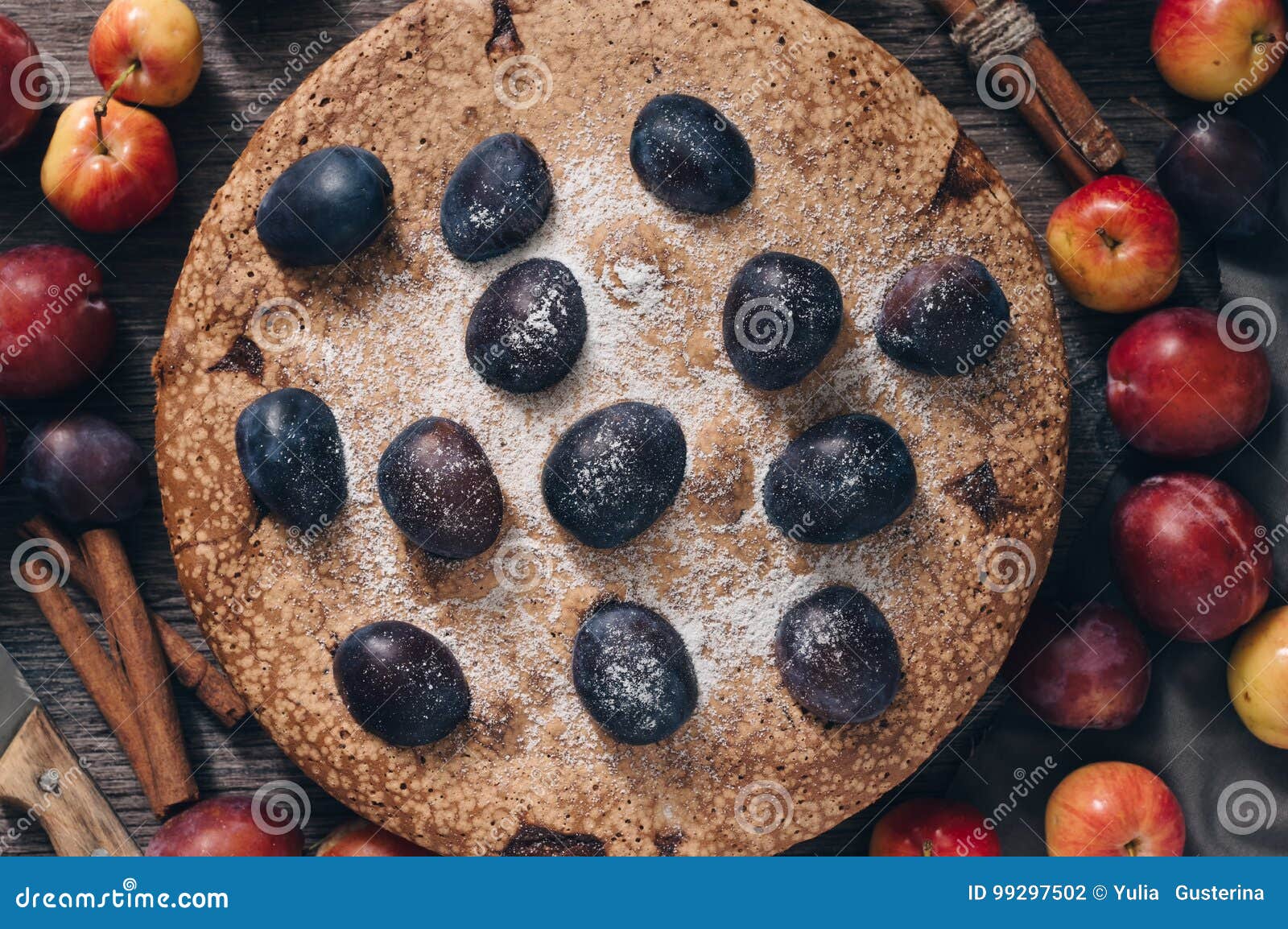 Cake with Fruit, Top View. Pie with Plums and Apples on a Wooden Table ...