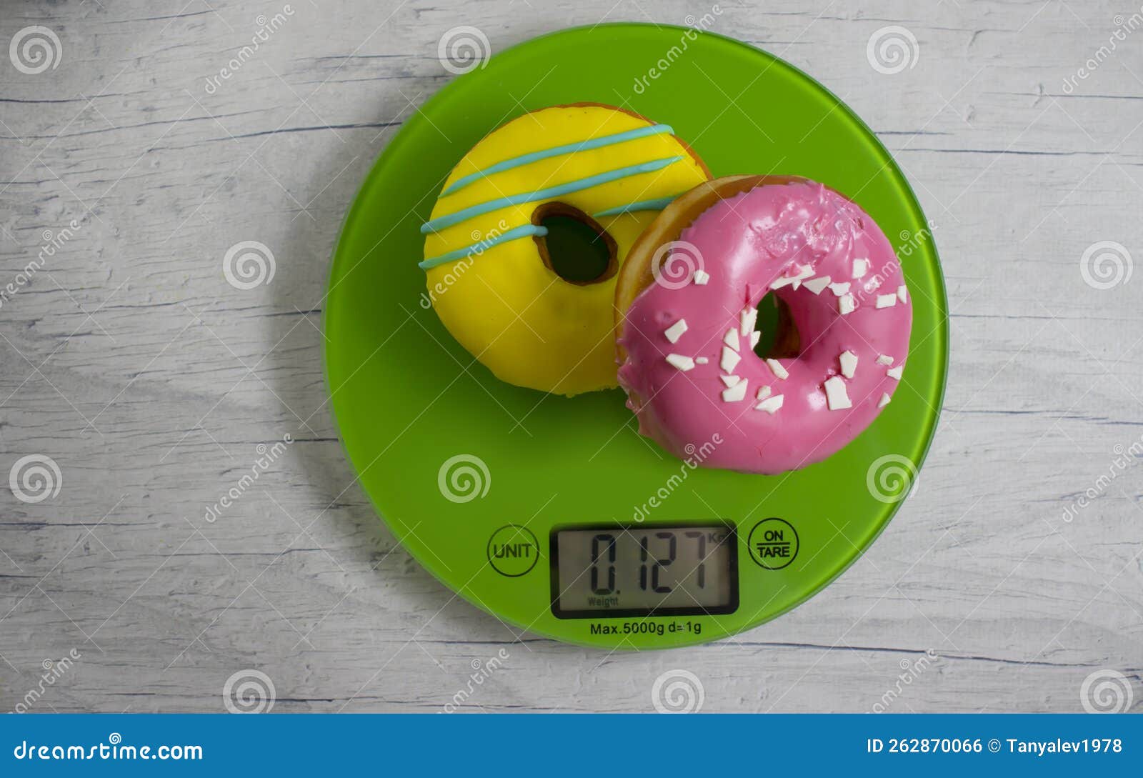 A Cupcake On The Scales Stock Photo | CartoonDealer.com #90124104