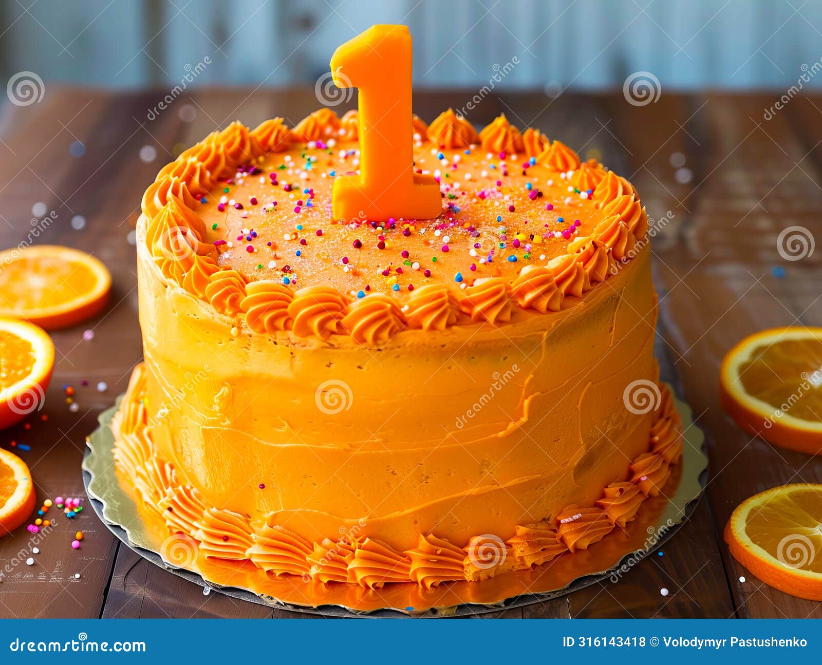 A Cake with an Orange Number One on Top Stock Photo - Image of pastry ...