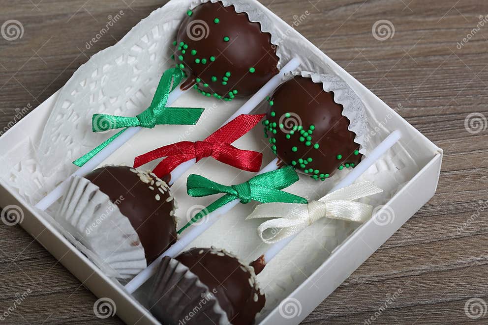 Cake Pops Decorated with a Bow of Braid, Packed in a Gift Box Stock ...