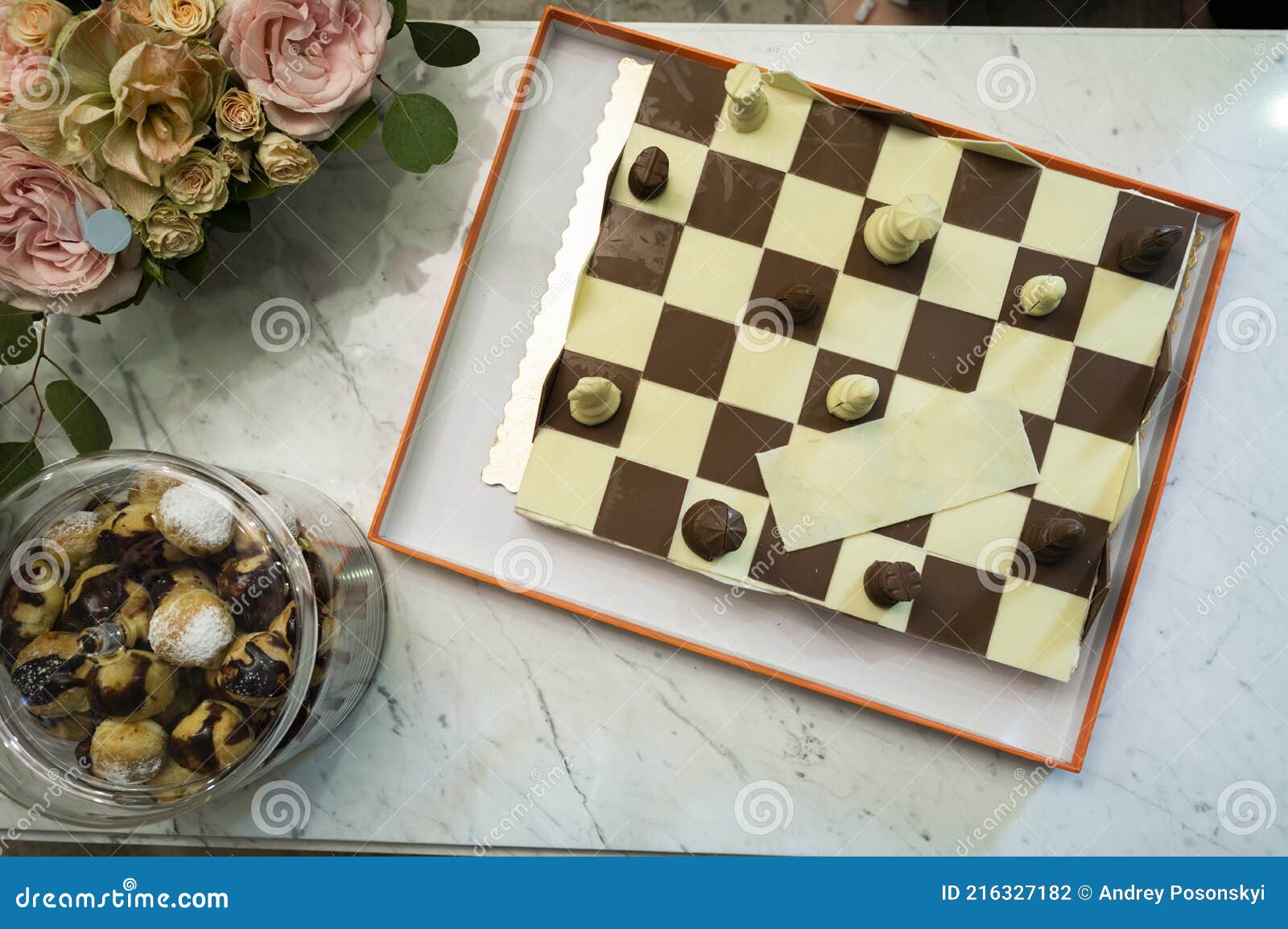 Cake in the Shape of a Checkerboard and Pastries on the Table Stock ...