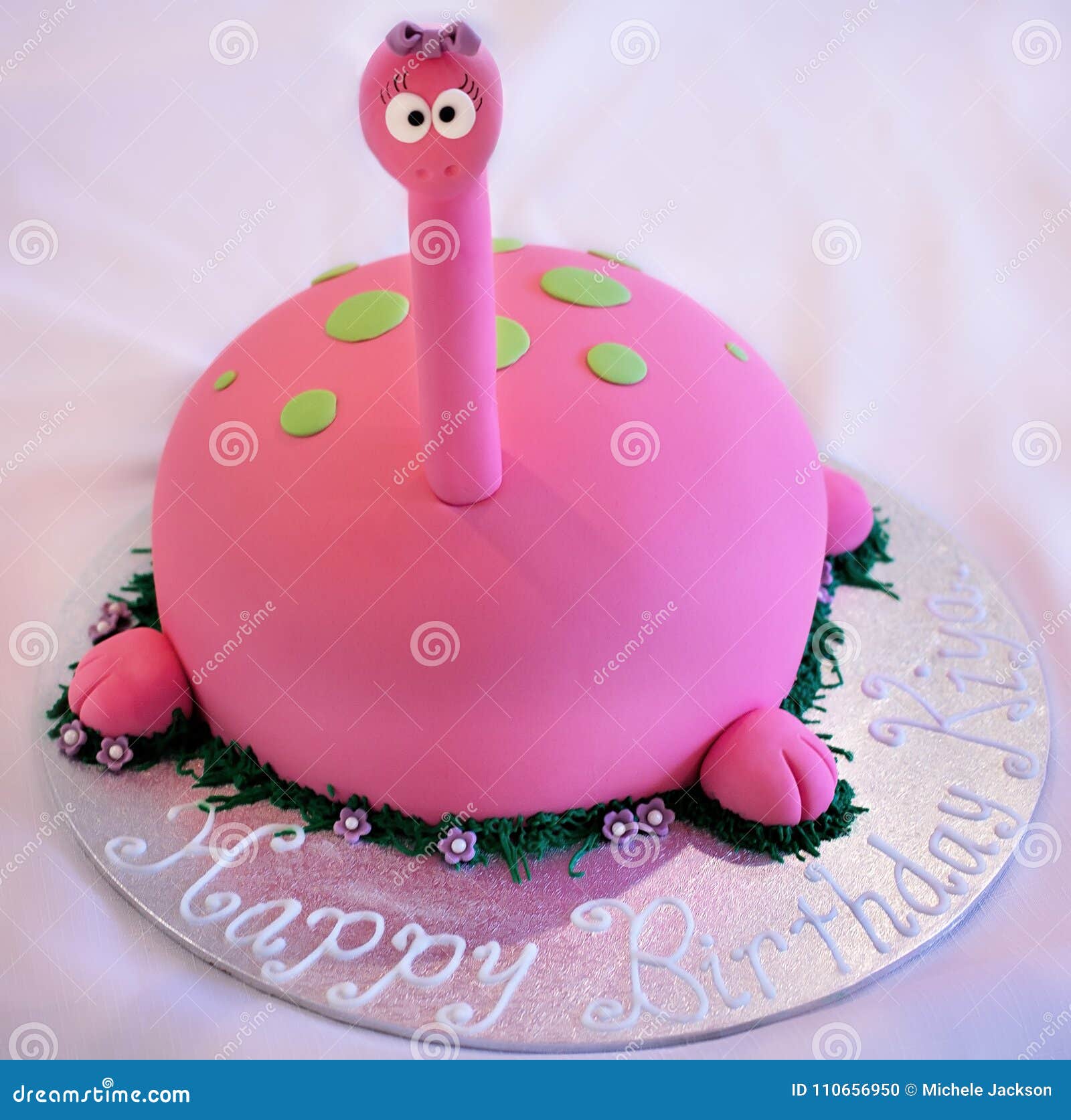 Pink Dinosaur Cake stock photo. Image of delicious, eyes - 110656950