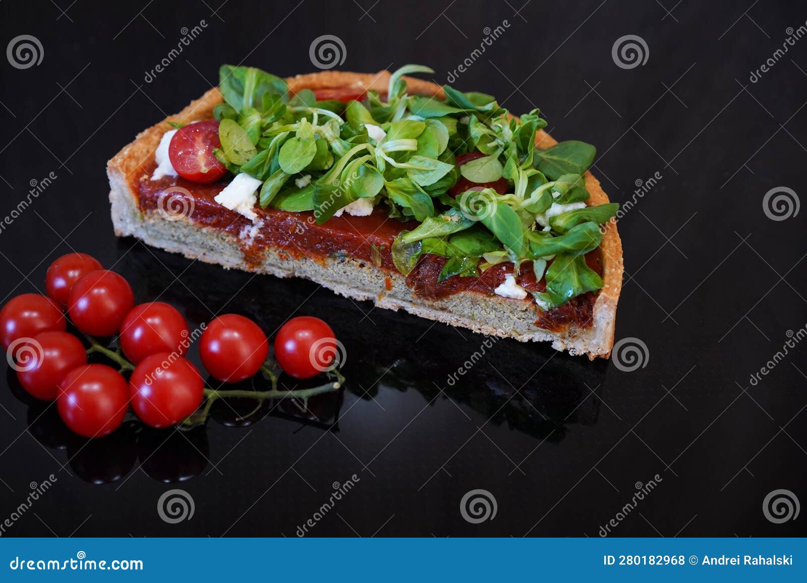 Cake Slice of Vegetables Lying on the Black Mirror Surface. Healthy ...