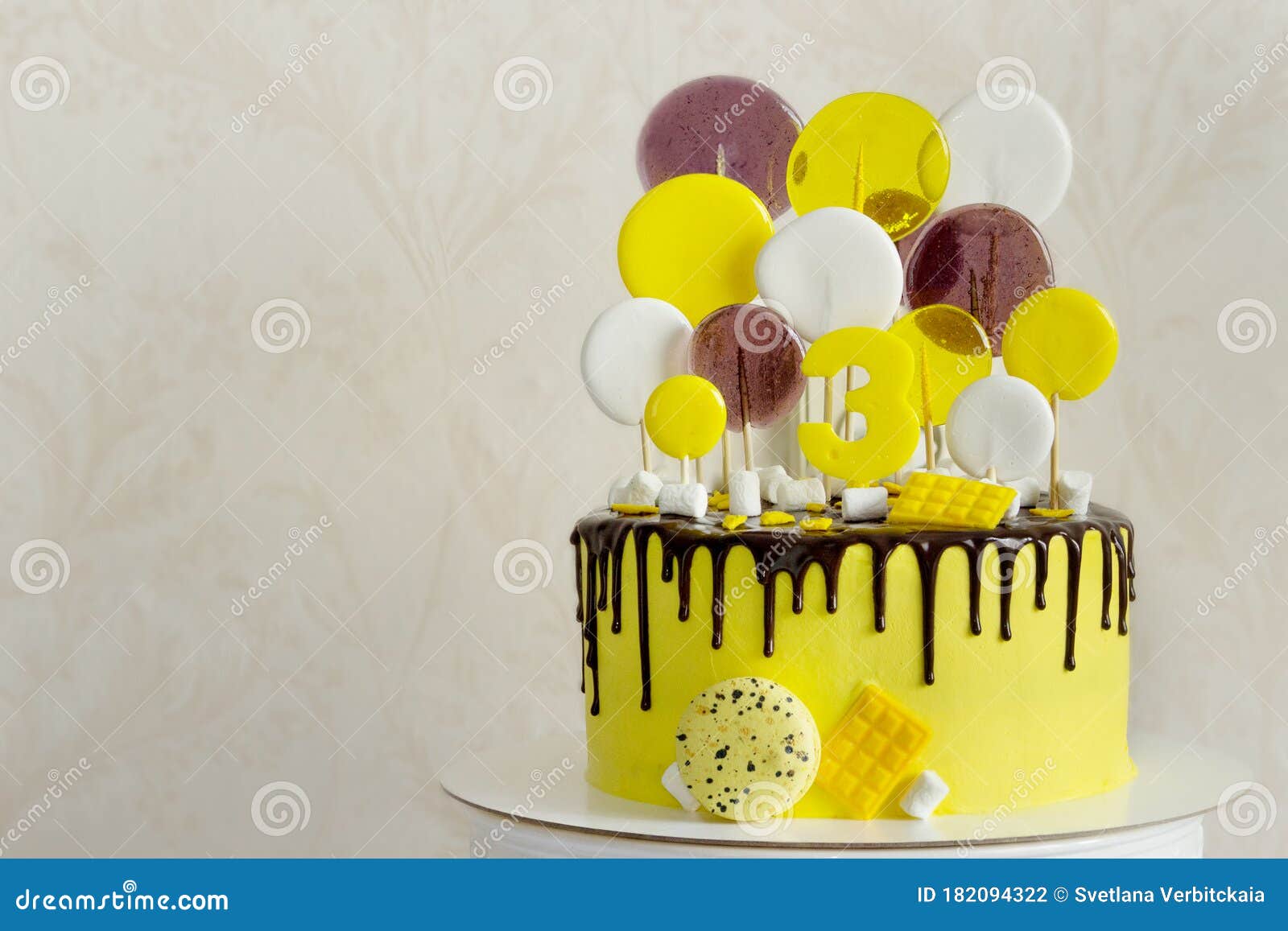 Cake with Yellow Cream and Chocolate Dripping Stock Photo - Image of ...