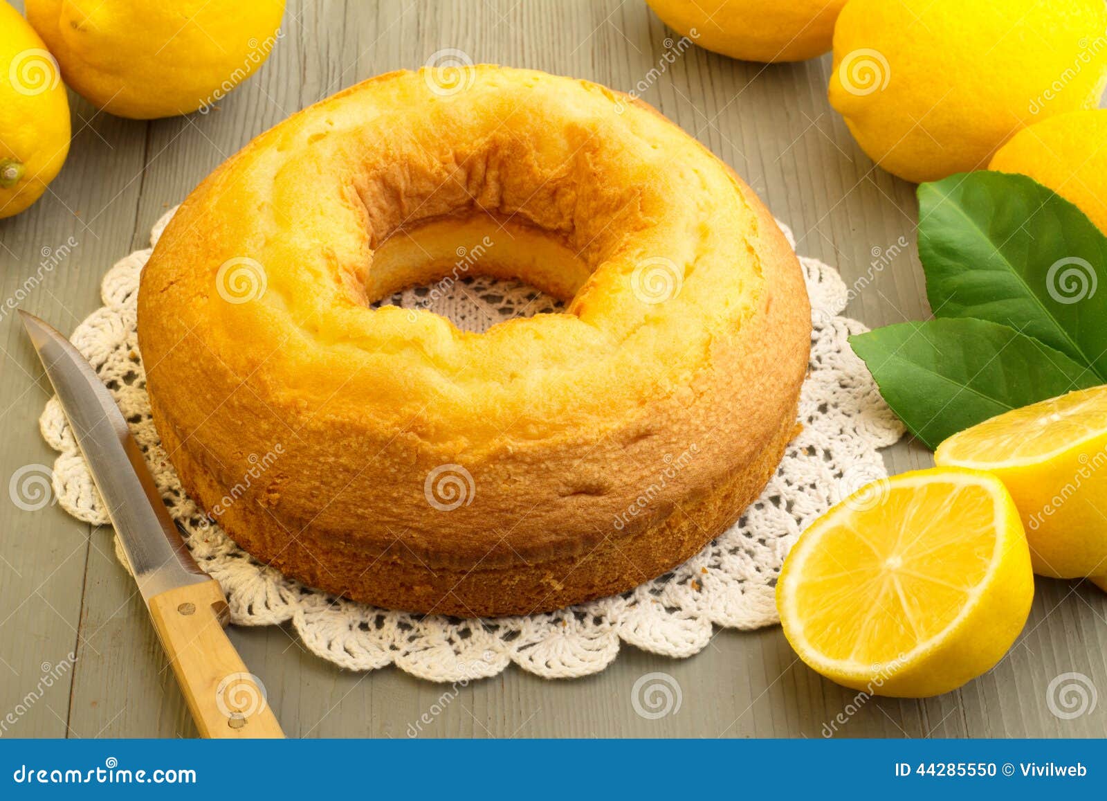 Cake and yellow lemons stock photo. Image of pastry, cake - 44285550
