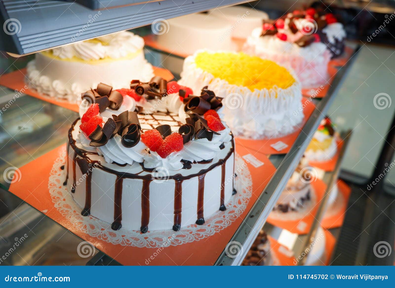 Cakes behind glass stock photo. Image of cake, shop - 114745702