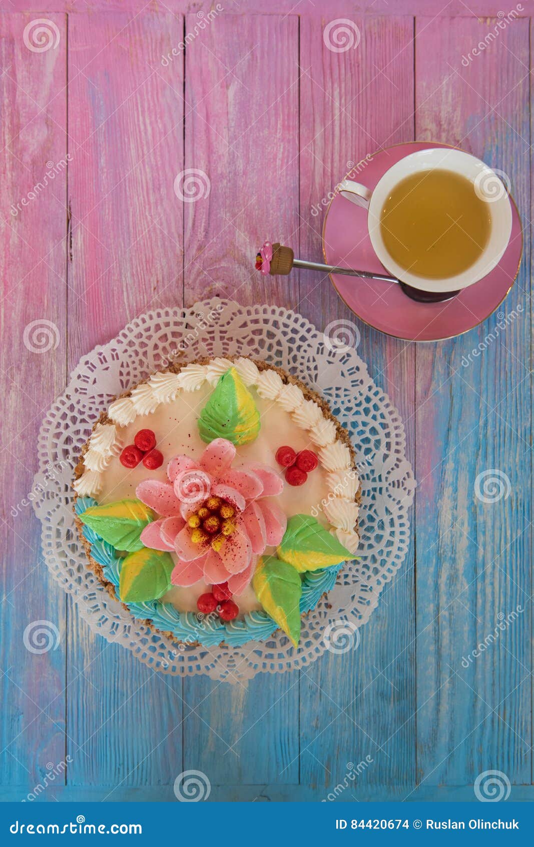 Cakes on color background stock photo. Image of structure - 84420674