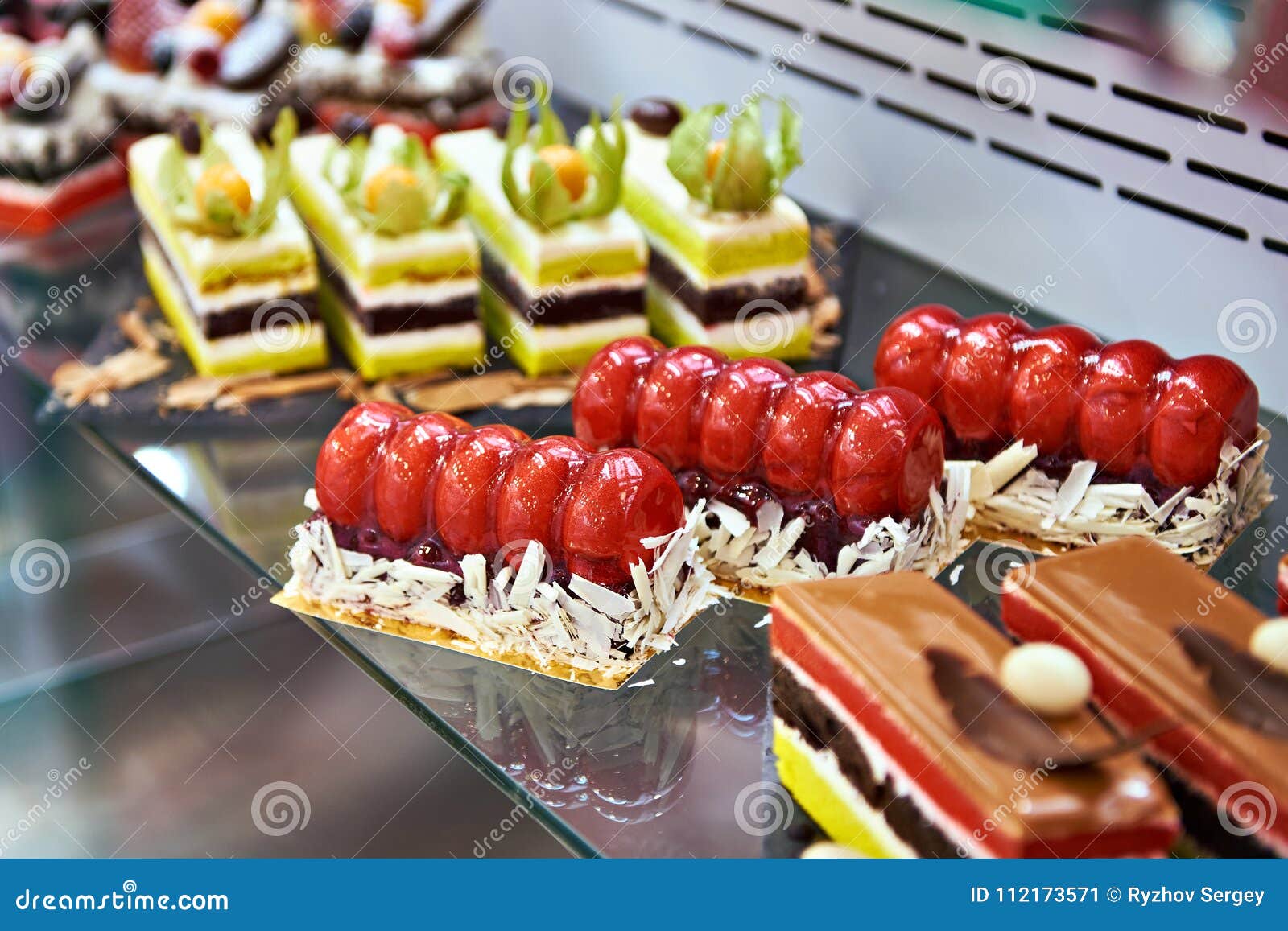 Cakes on counter in store stock image. Image of cakes - 112173571