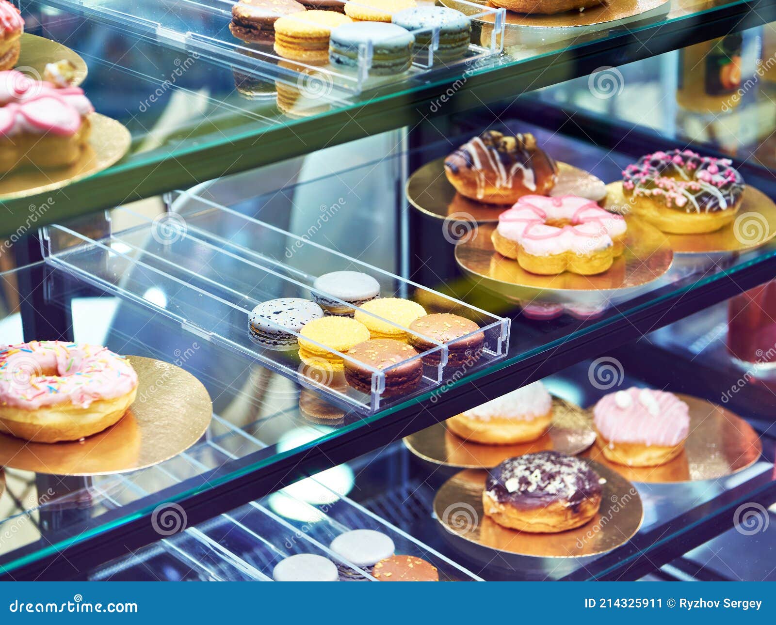 Cakes on counter in store stock image. Image of glass - 214325911