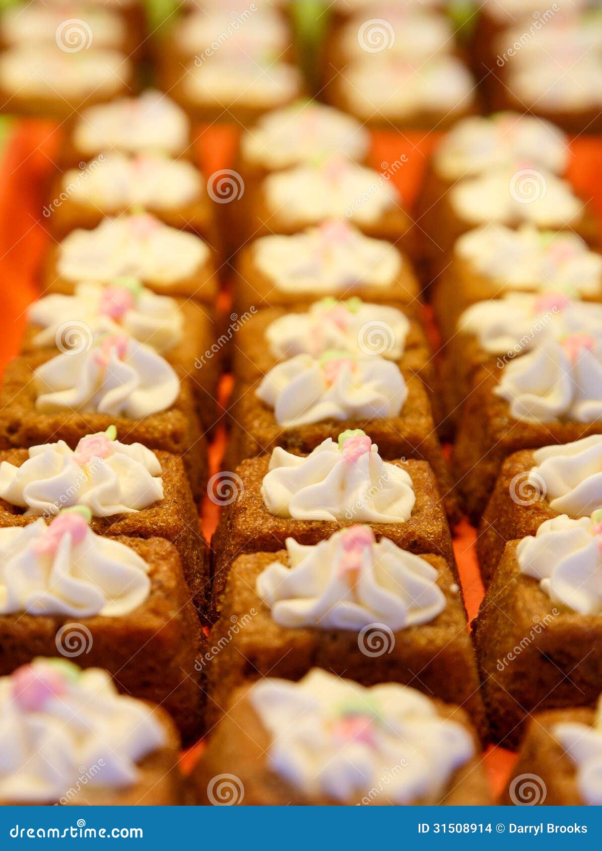 Cakes with Icing in Bakery Case Stock Photo - Image of pastries, cale ...