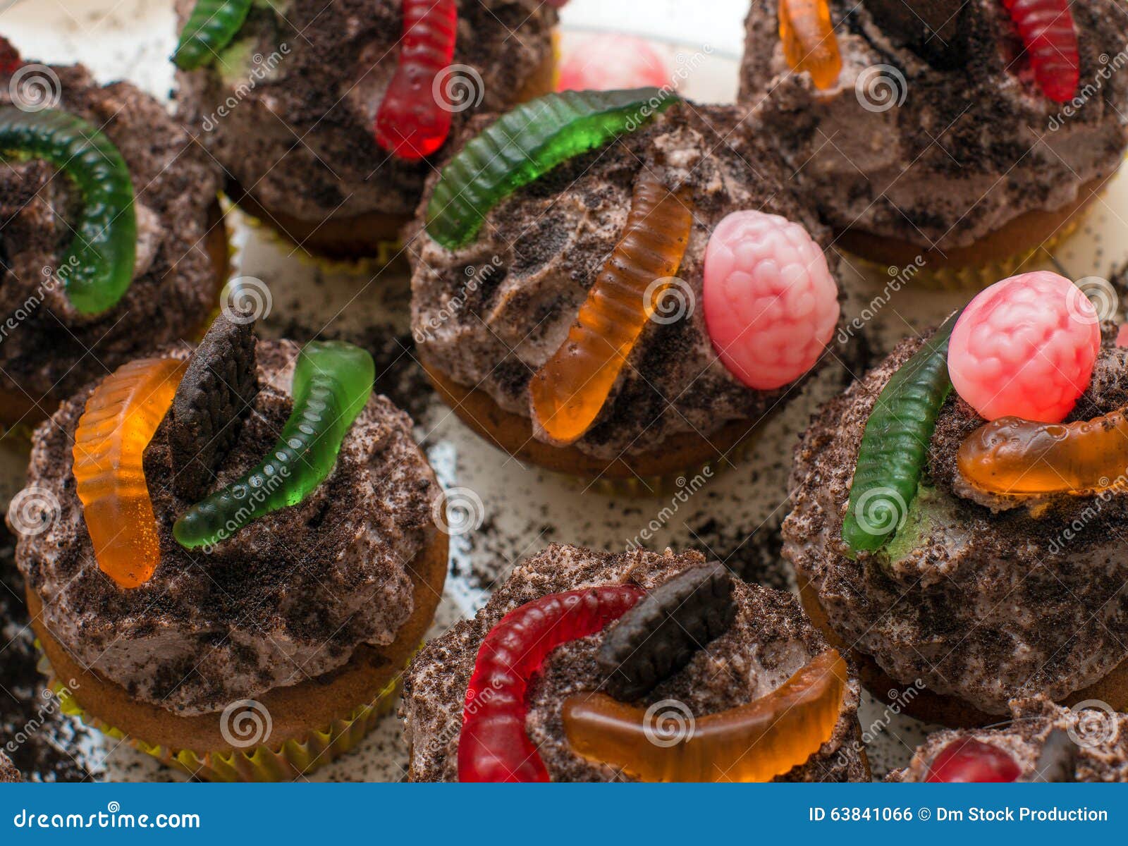 Cakes with sweet worms. stock photo. Image of food, muffin - 63841066