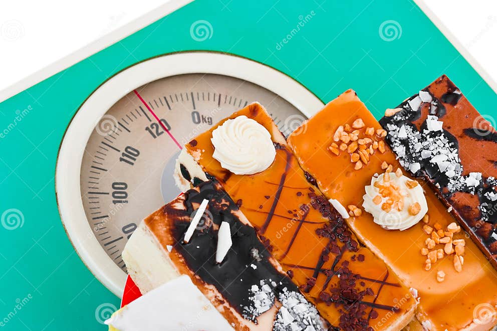 Cakes on weight scale stock photo. Image of kitchen, dish - 12847718