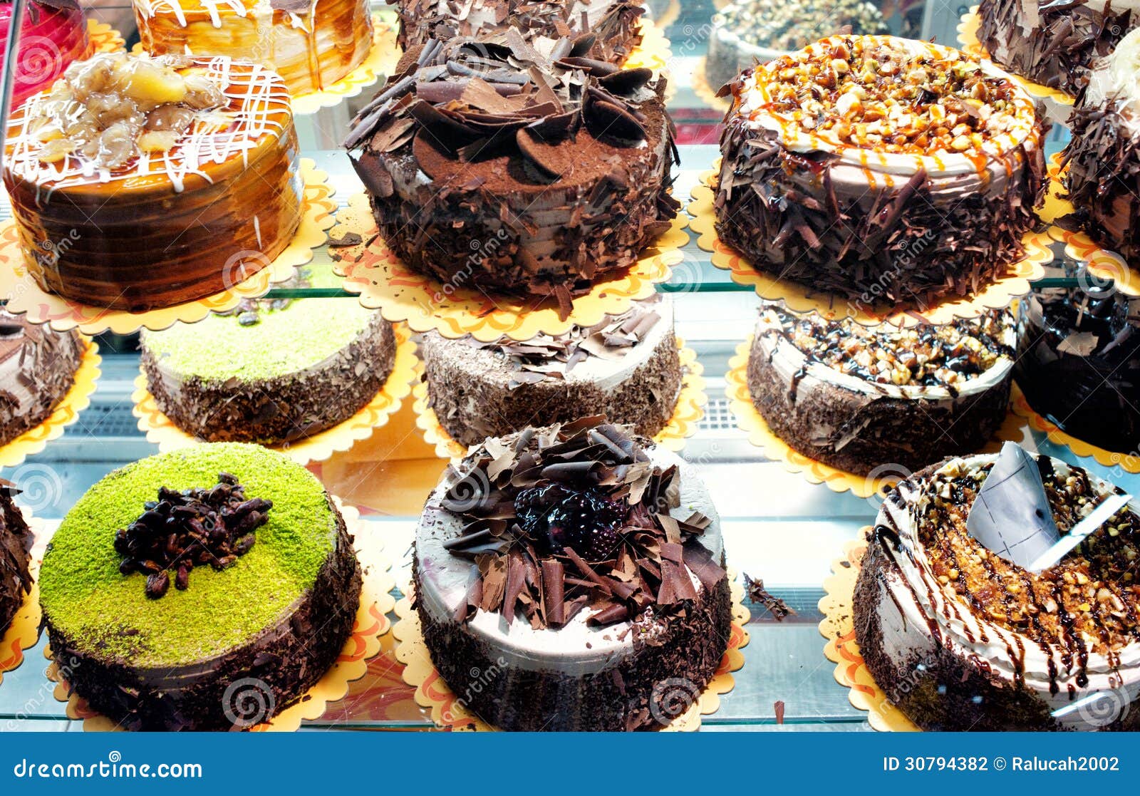 Cakes in the window stock photo. Image of dessert, cocoa - 30794382