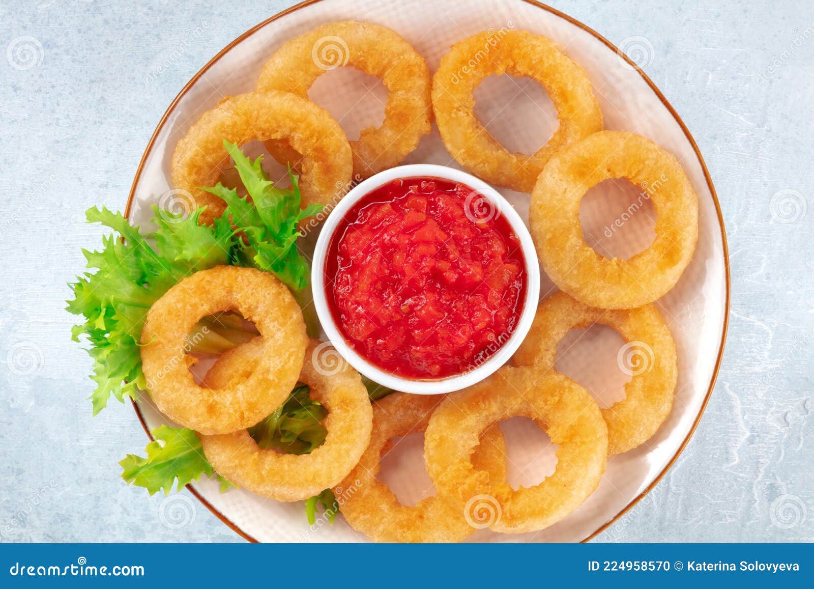 Calamari Rings Close-up. Deep Fried Squid Rings on a Plate Stock Photo ...