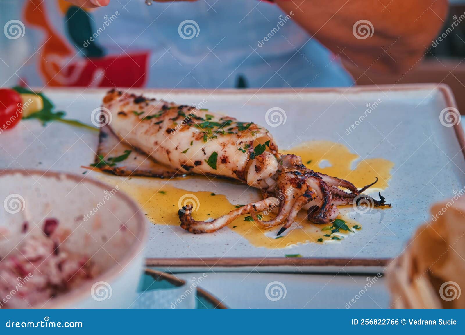 Calamari Served on the Table Stock Photo - Image of eating, household ...