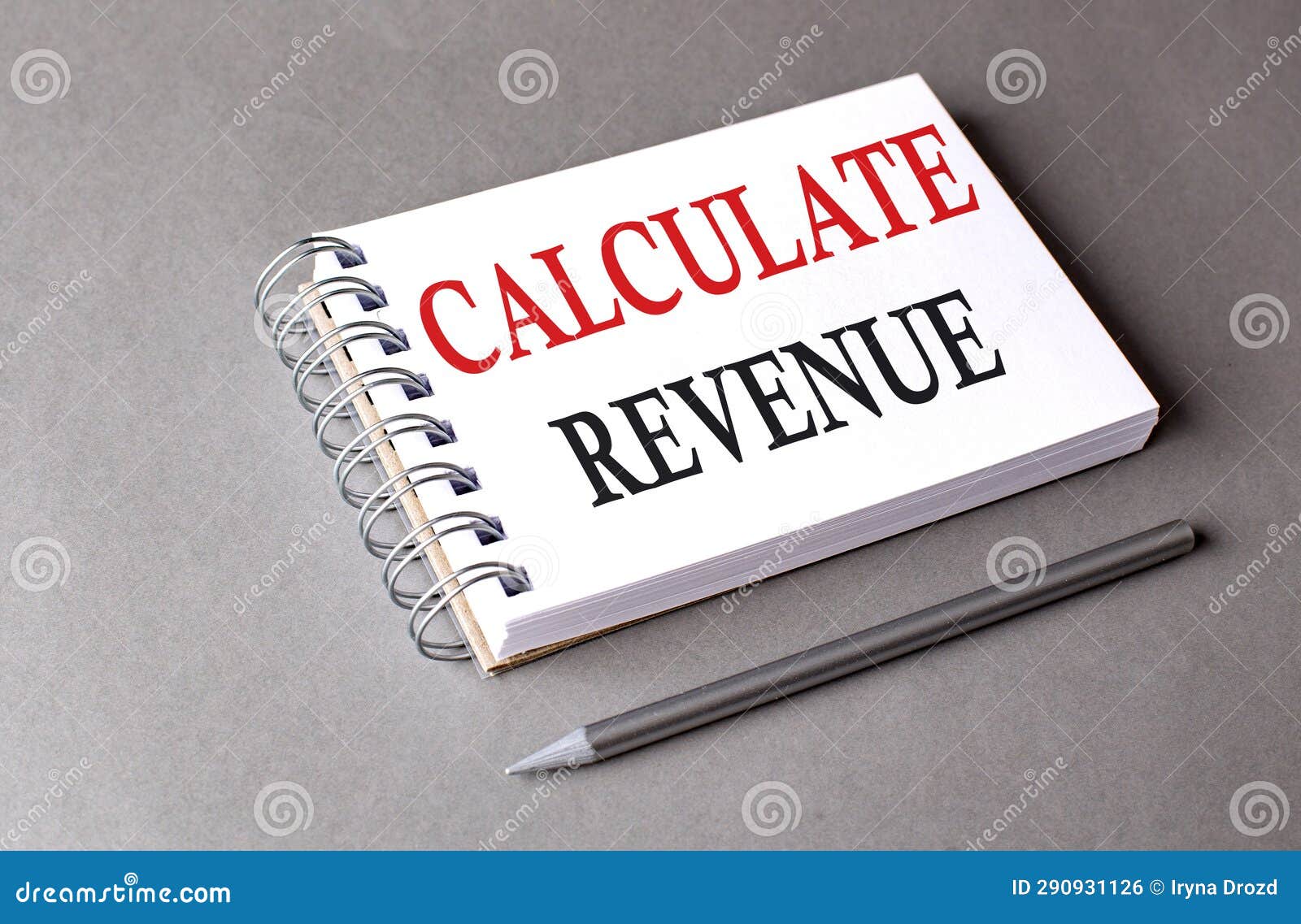 CALCULATE REVENUE Word on Notebook on Grey Background Stock ...