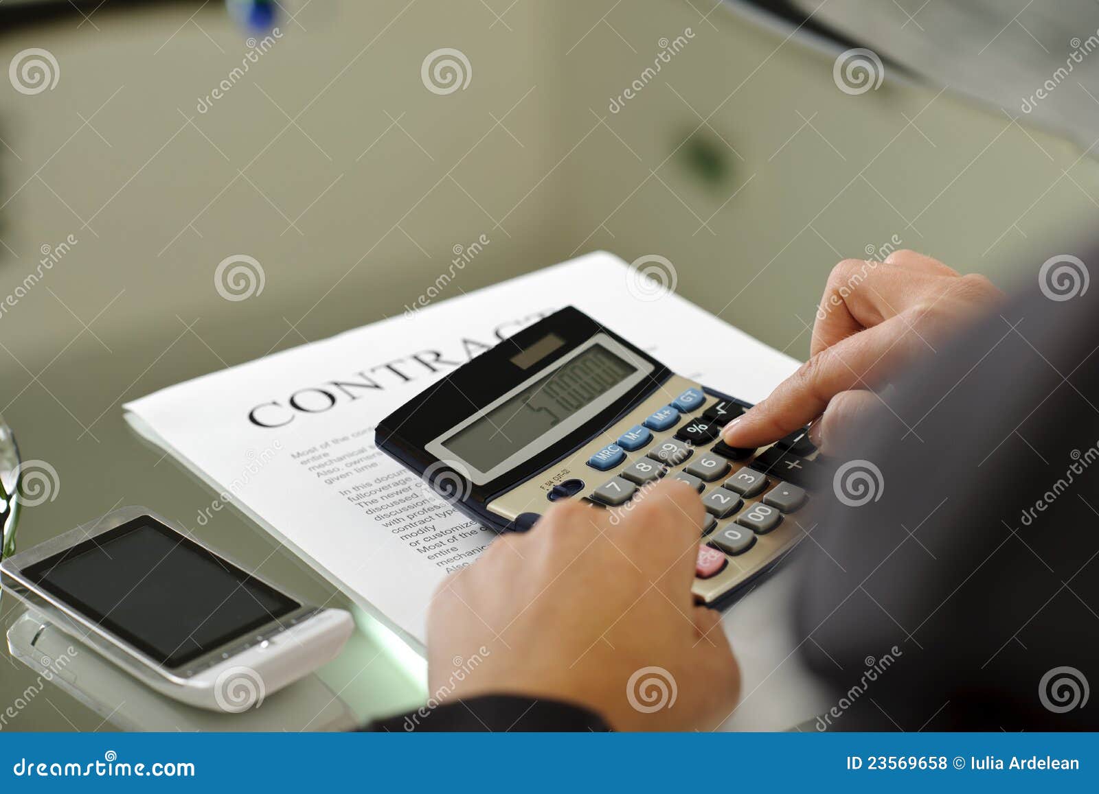 Calculating bills stock photo. Image of people, success - 23569658