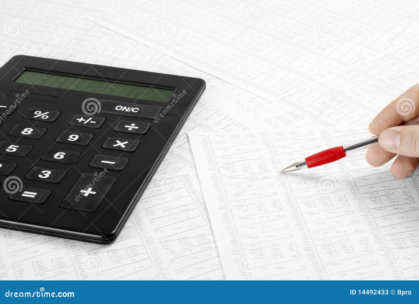Calculating financial data stock image. Image of hand - 14492433