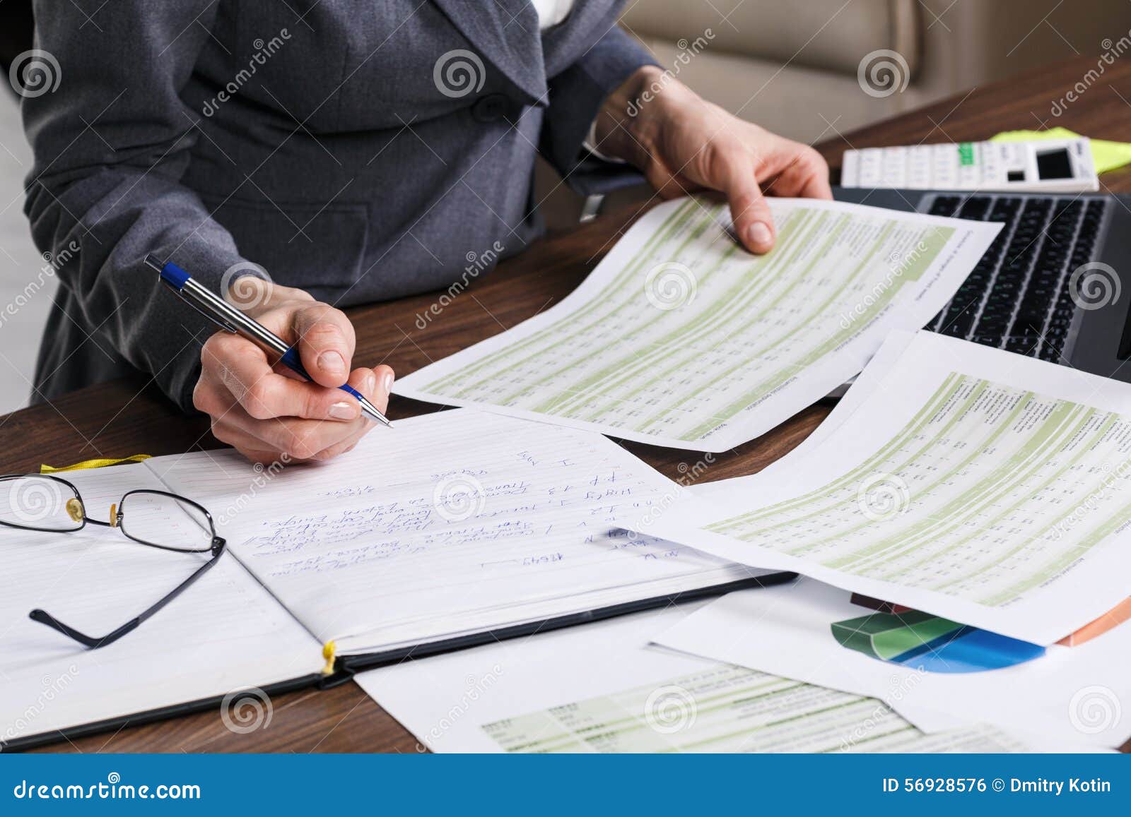 Calculating On The Office Desk Stock Photo | CartoonDealer.com #56928576