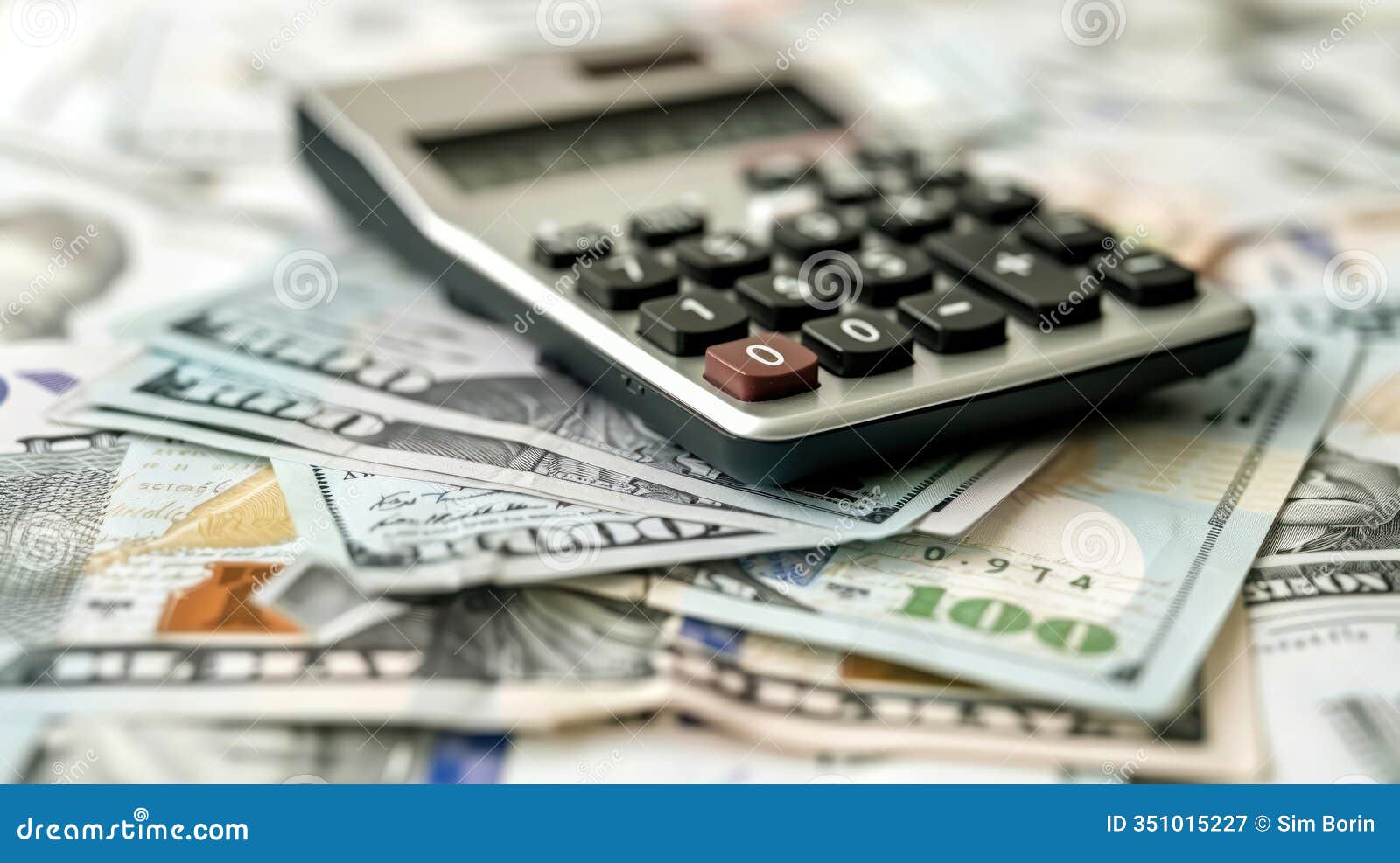 A Calculator with Bills and Receipts, Representing the Calculation and ...